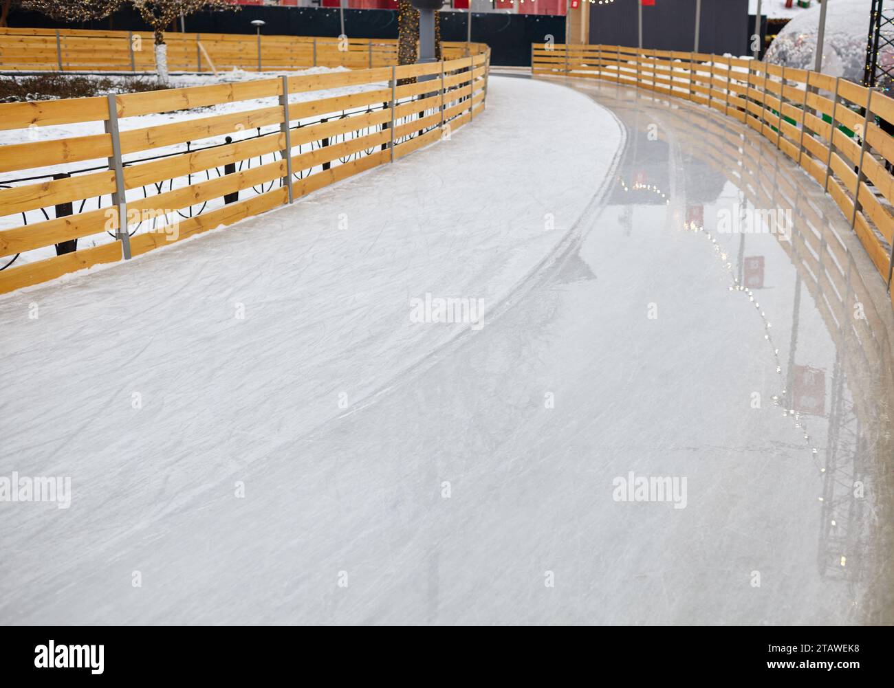 Outdoor skating rink, icy surface. Skating in winter city rink Stock ...
