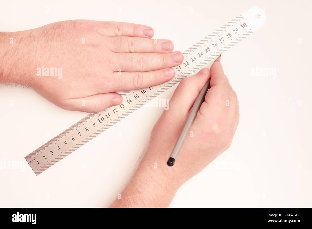 Hands Hold Ruler And Pencil For Drawing Line. The Engineering Design ...