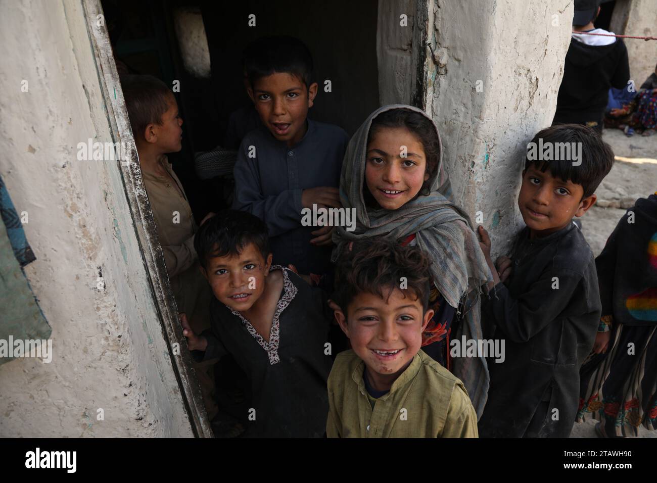 Happy Afghan children in need, looking at the camera and smiling Stock ...