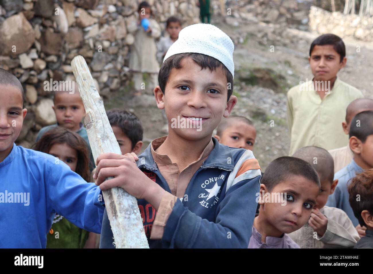 Happy Afghan children in need, looking at the camera and smiling Stock ...