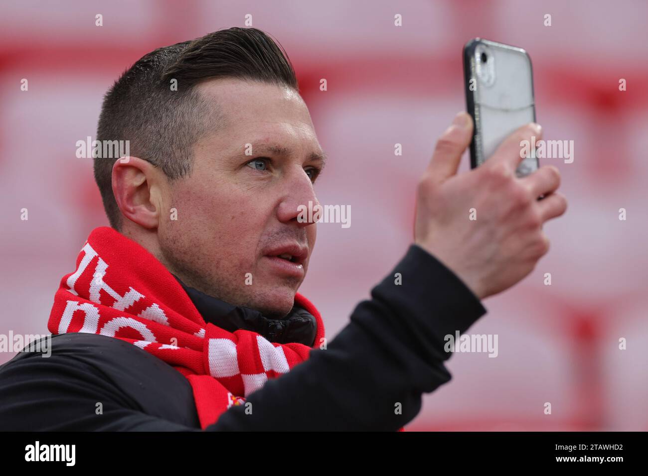 A Liverpool fan arrives ahead of the Premier League match Liverpool vs ...