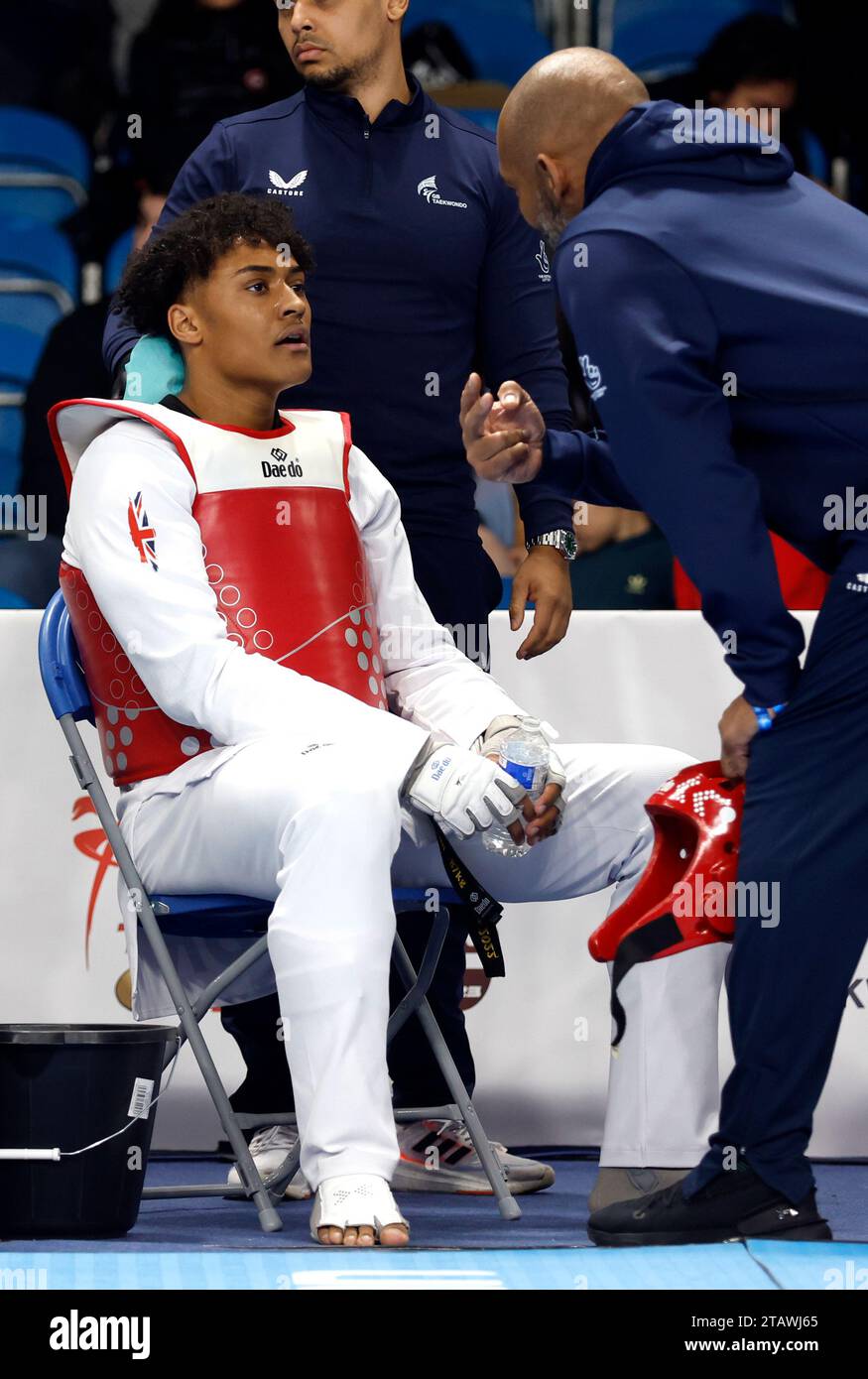 Great Britain's Caden Cunningham talks to his coach on day three of the ...
