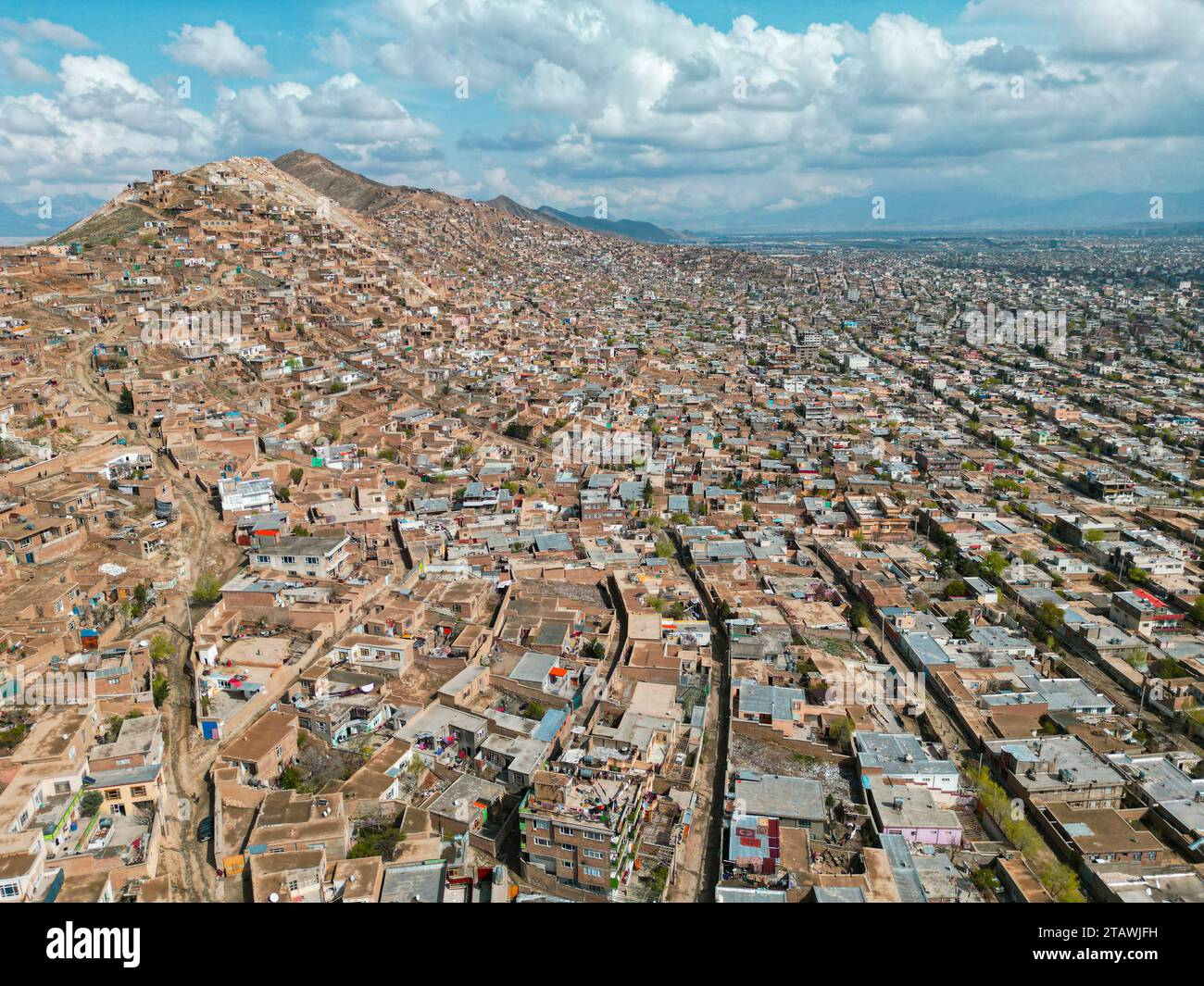 Aerial view of Kabul city, with Kabul city buildings and a building on ...