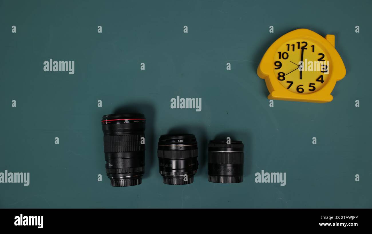 Camera lens, Canon lens on gray background, dark background Stock Photo ...
