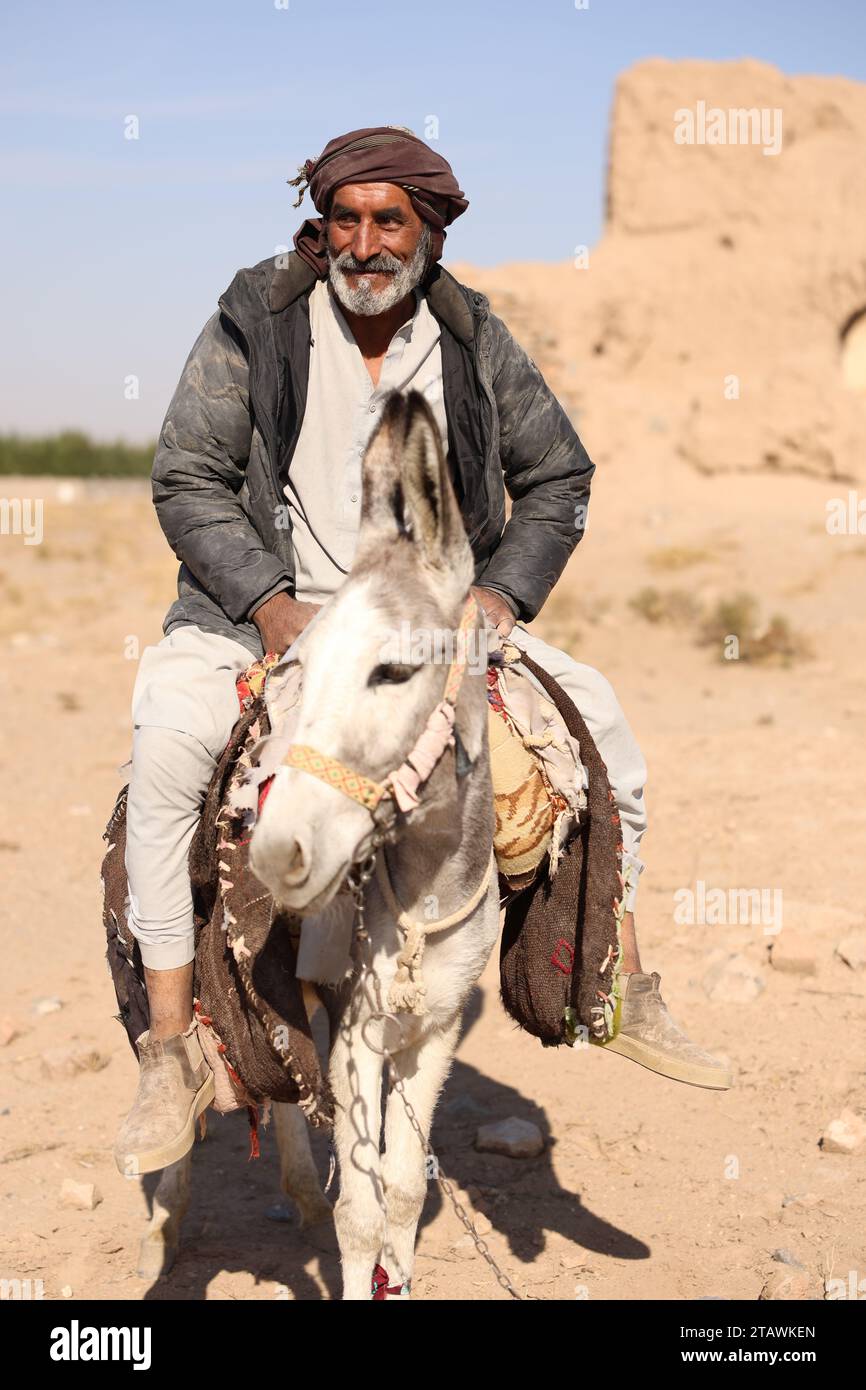 Man riding donkey hi-res stock photography and images - Alamy