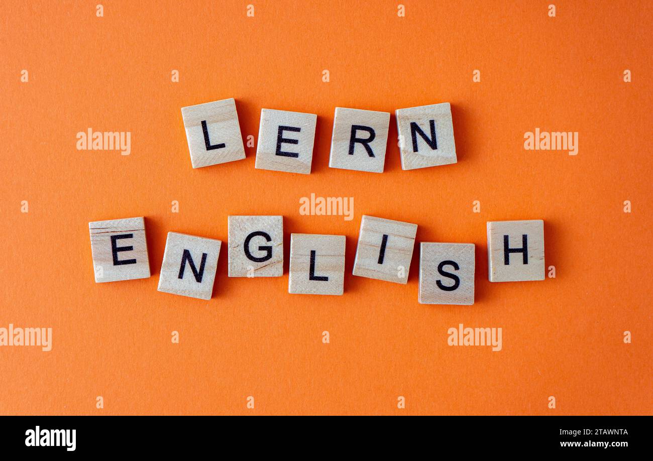 Word learn English. Motivation. The phrase is laid out in wooden ...