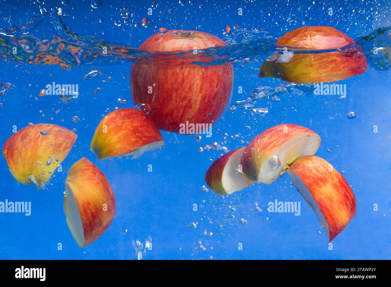 apple under water with a trail of transparent bubbles Stock Photo - Alamy