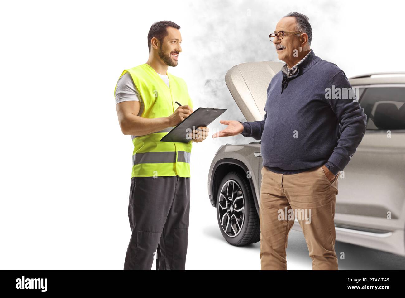 Driver explaining a car problem to a road help worker isolated on white ...