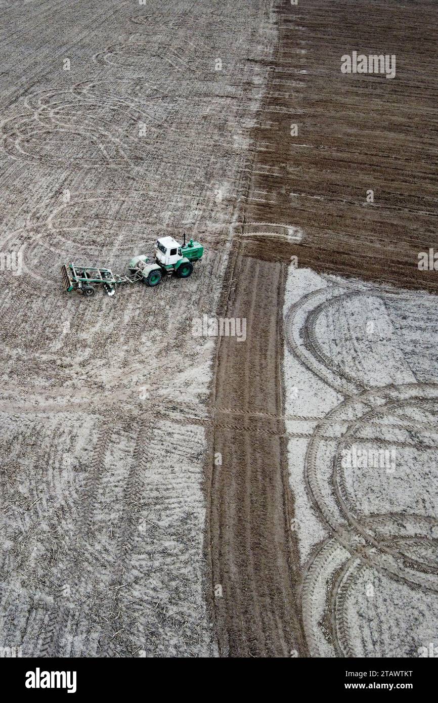Aerial view agricultural tractor plows hi-res stock photography and ...