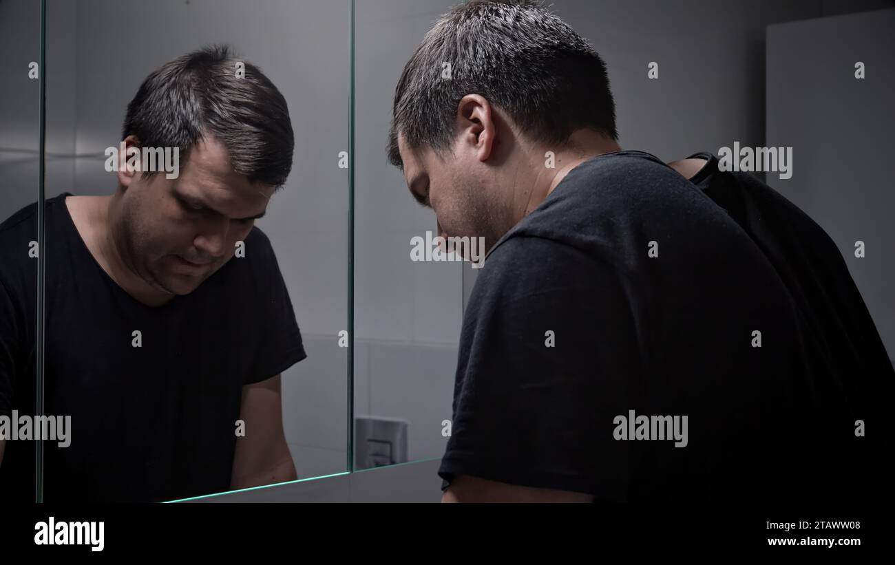 Black male face reflection sad hi-res stock photography and images - Alamy