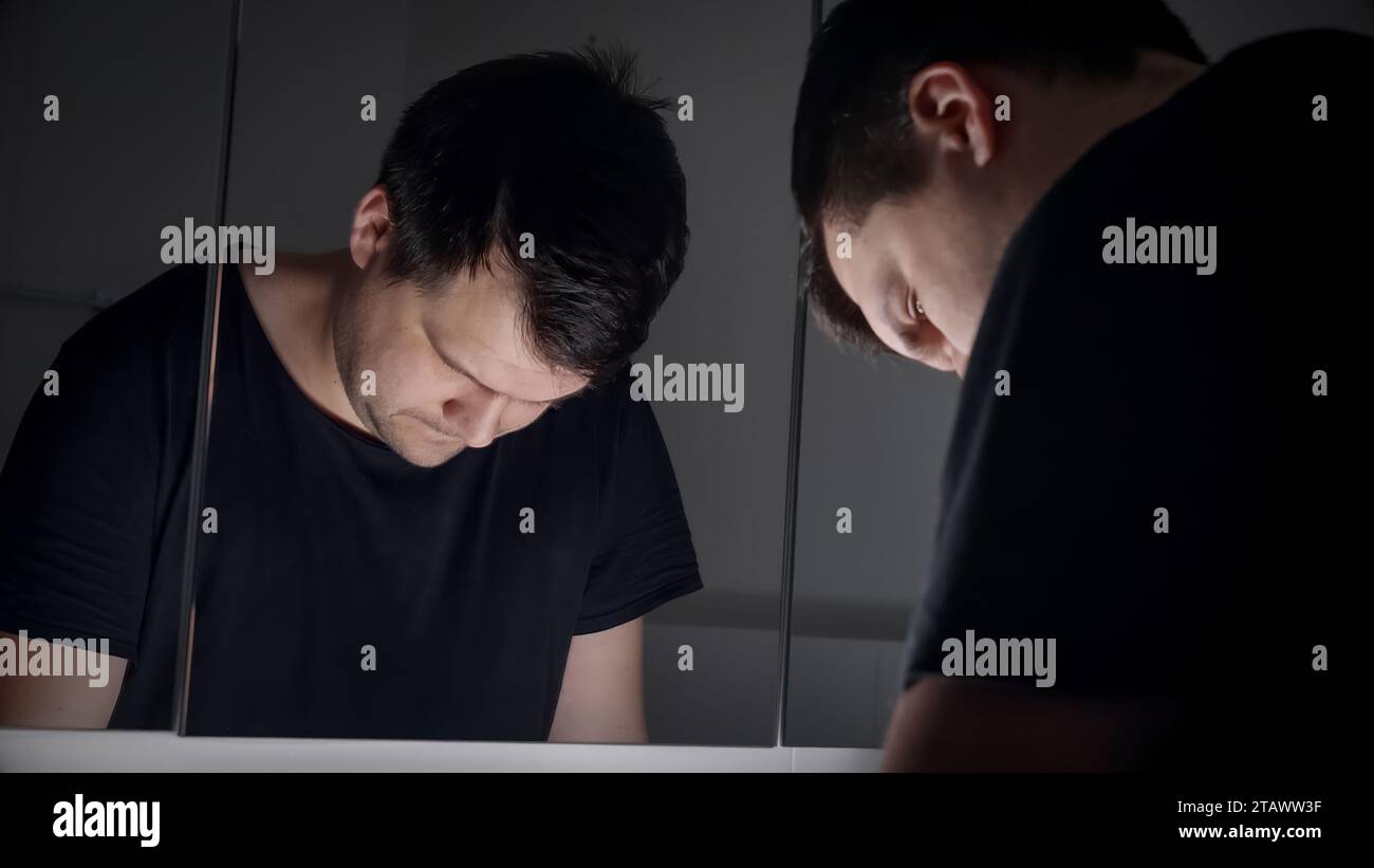 Black male face reflection sad hi-res stock photography and images - Alamy