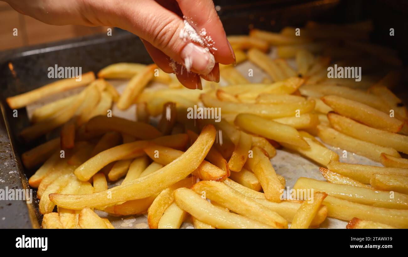 Pouring salt chips hi-res stock photography and images - Alamy