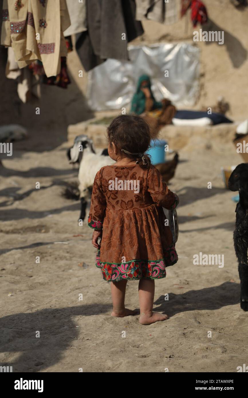 Portrait of a young poor Afghan girl in the village | Afghan girl Kabul ...
