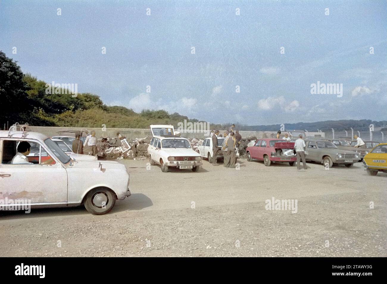colourised bw photo of hastings refuse tip in 1979 with the cars full ...