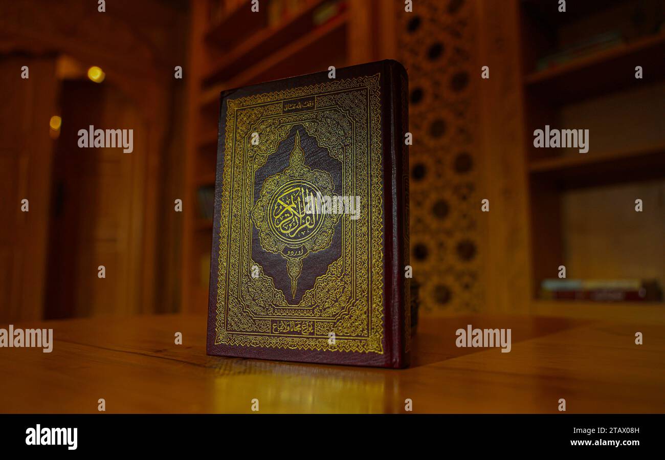 Holy Al Quran with written Arabic calligraphy meaning of Al Quran on ...