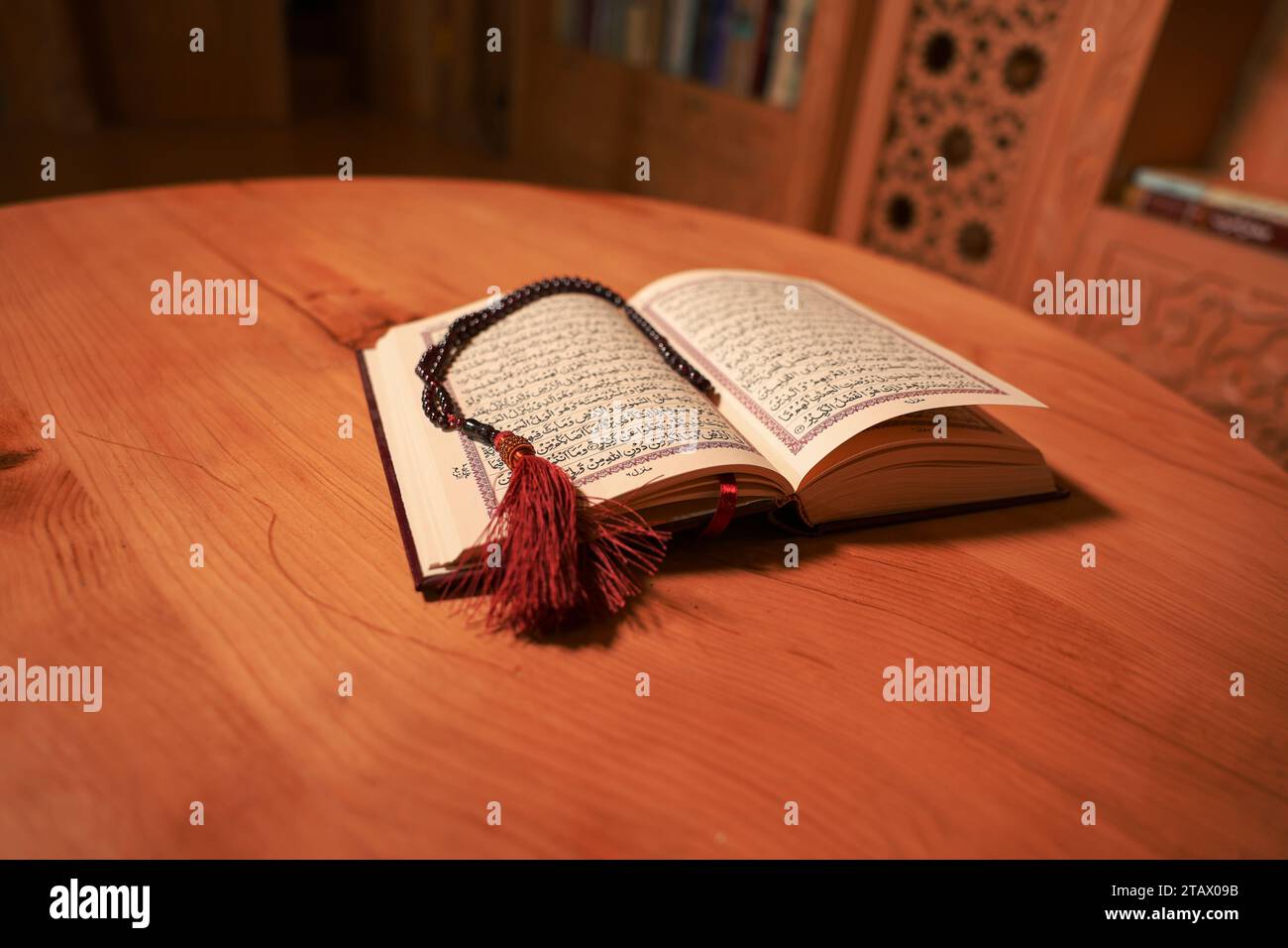 Holy Al Quran with written Arabic calligraphy meaning of Al Quran on ...