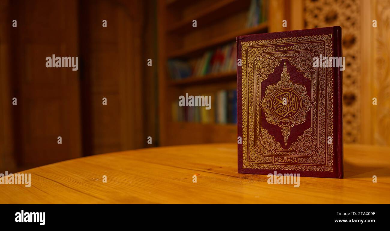 Holy Al Quran with written Arabic calligraphy meaning of Al Quran on ...