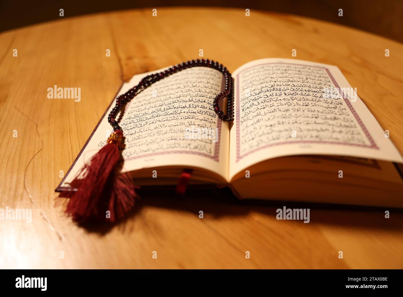 Holy Al Quran with written Arabic calligraphy meaning of Al Quran on ...
