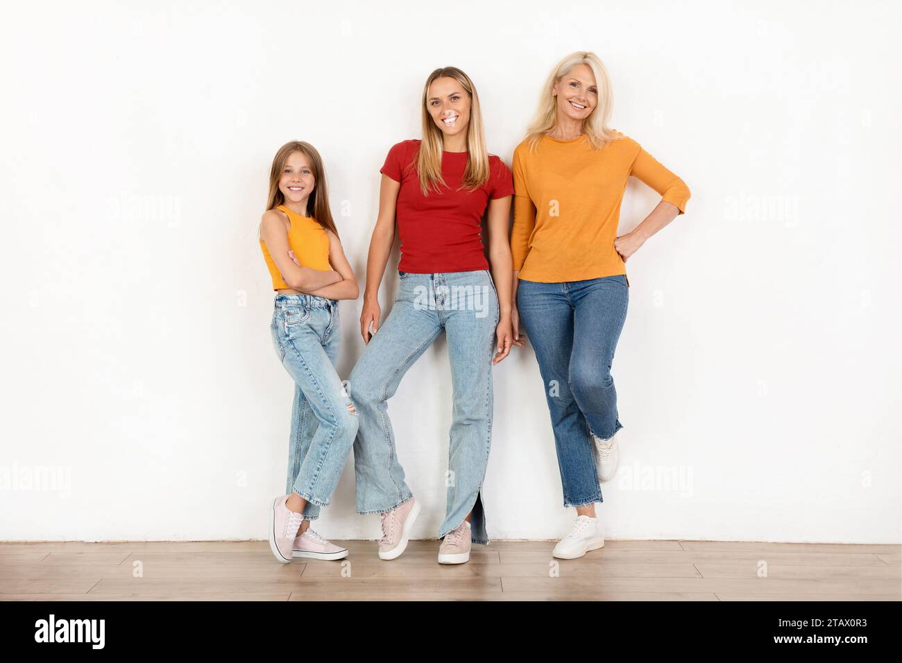 Happy beautiful three generation women family posing together Stock ...