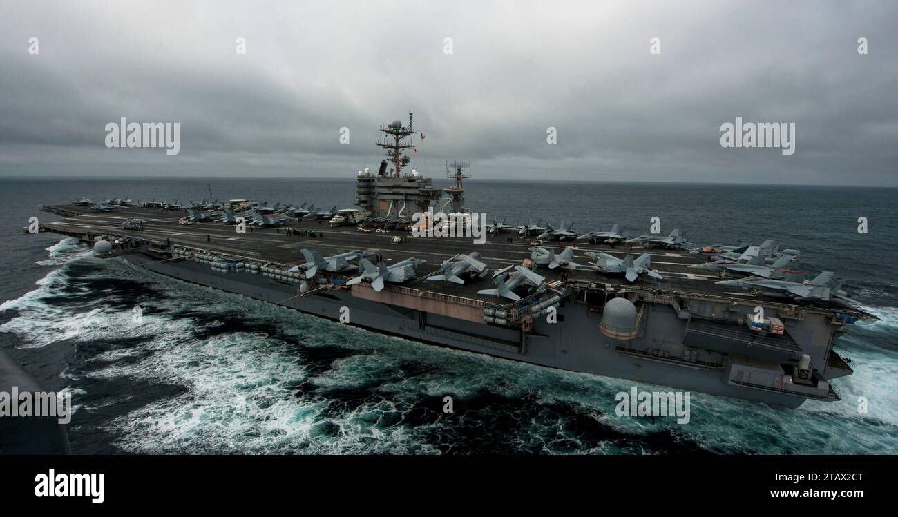 The Nimitz-class aircraft carrier USS Abraham Lincoln transits the ...