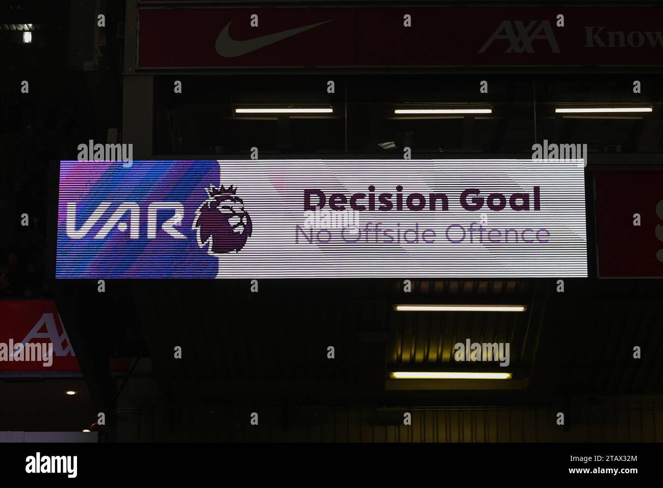 The big screen displays a VAR goal check during the Premier League ...