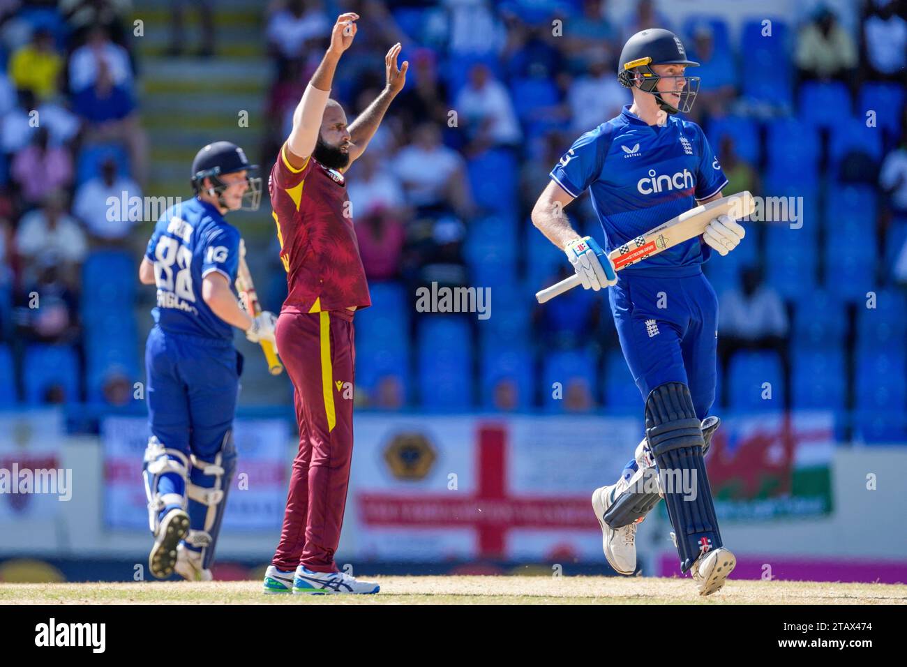 England's Zak Crawley scores runs as West Indies' bowler Yannic Cariah ...