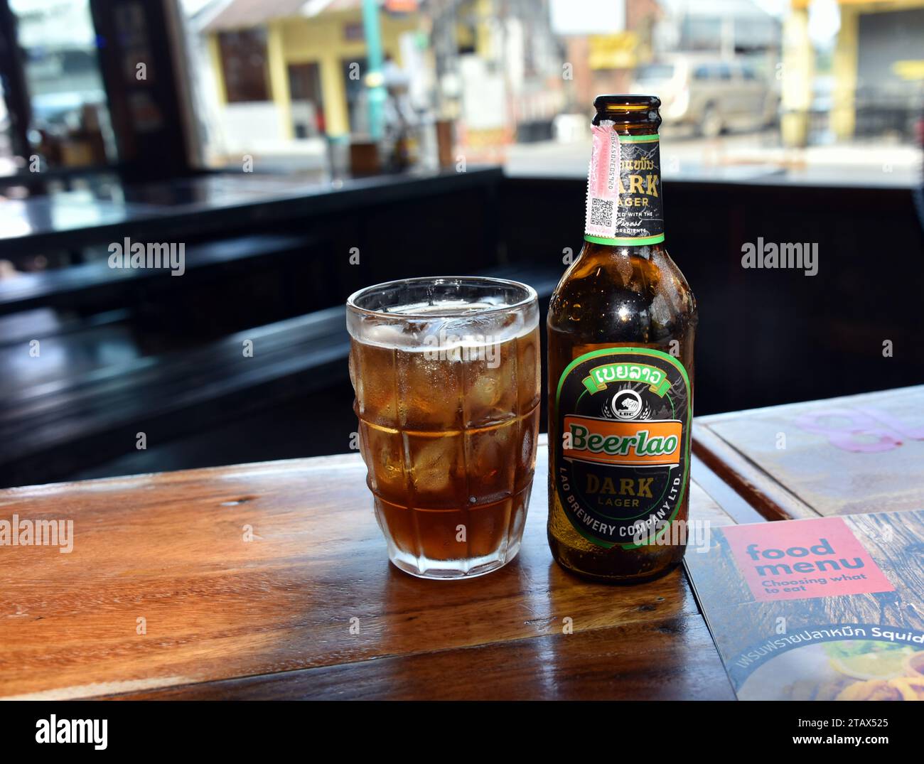 glass with bottle of beer laos in Nakhon Phanom, Isaan, Northern ...