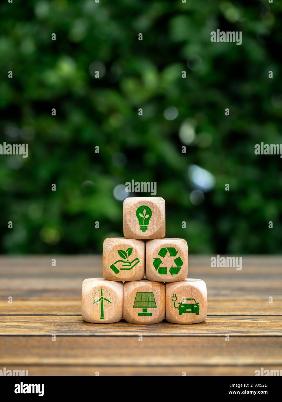 Eco friendly, green renewable energy icons on wooden cube block stack ...