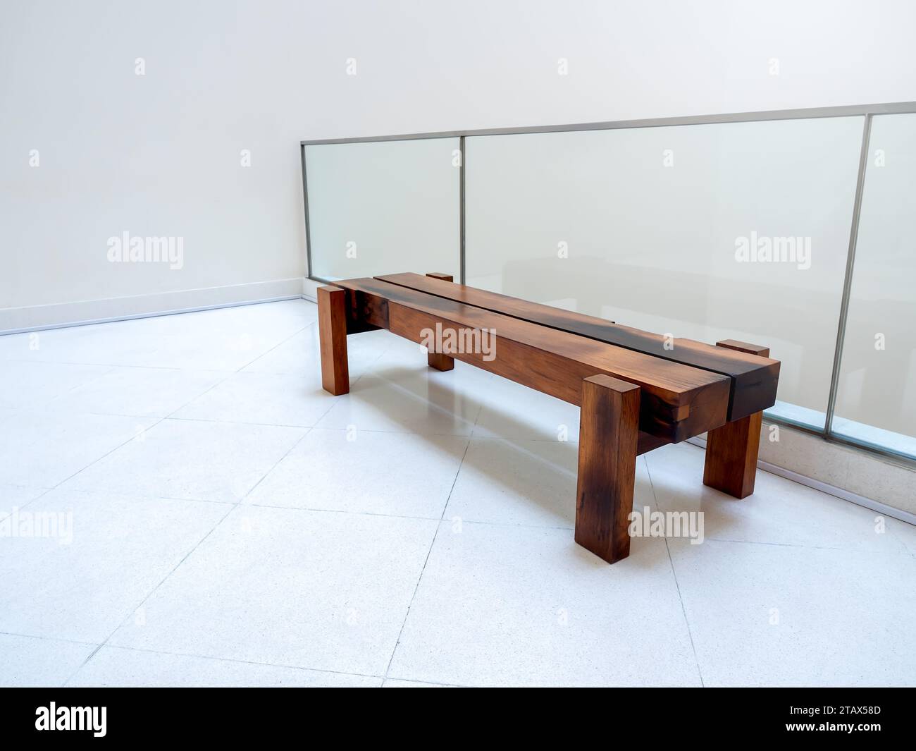 Thick cut rustic oak bench with nobody. Empty brown long thick wooden ...