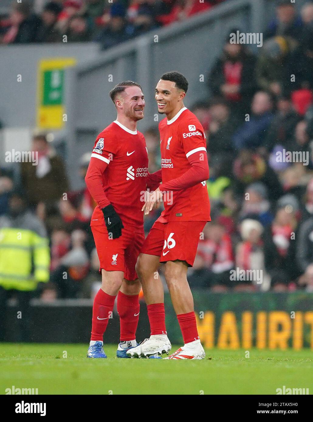 Liverpool's Alexis Mac Allister (left) celebrate with Trent Alexander ...