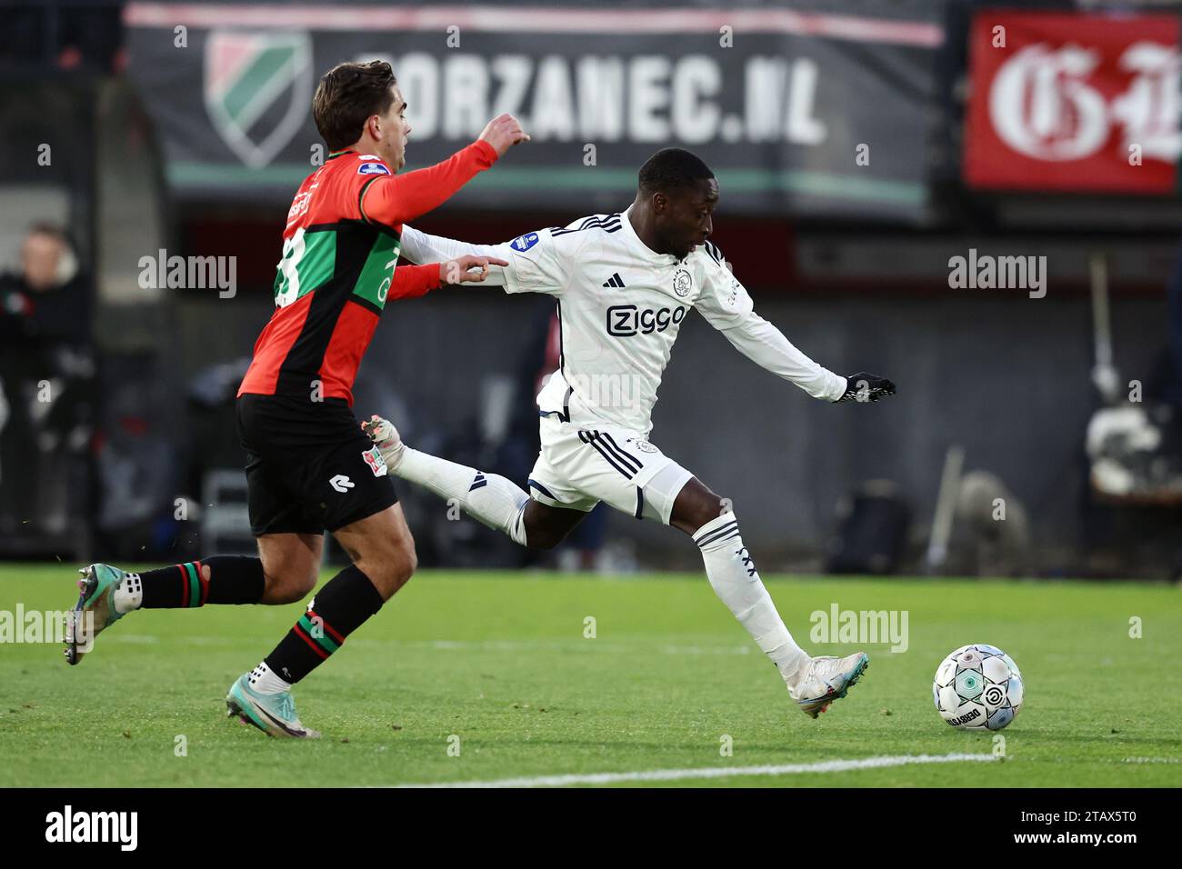 NIJMEGEN - (l-r) Bart van Rooij of NEC Nijmegen, Carlos Forbs of Ajax ...