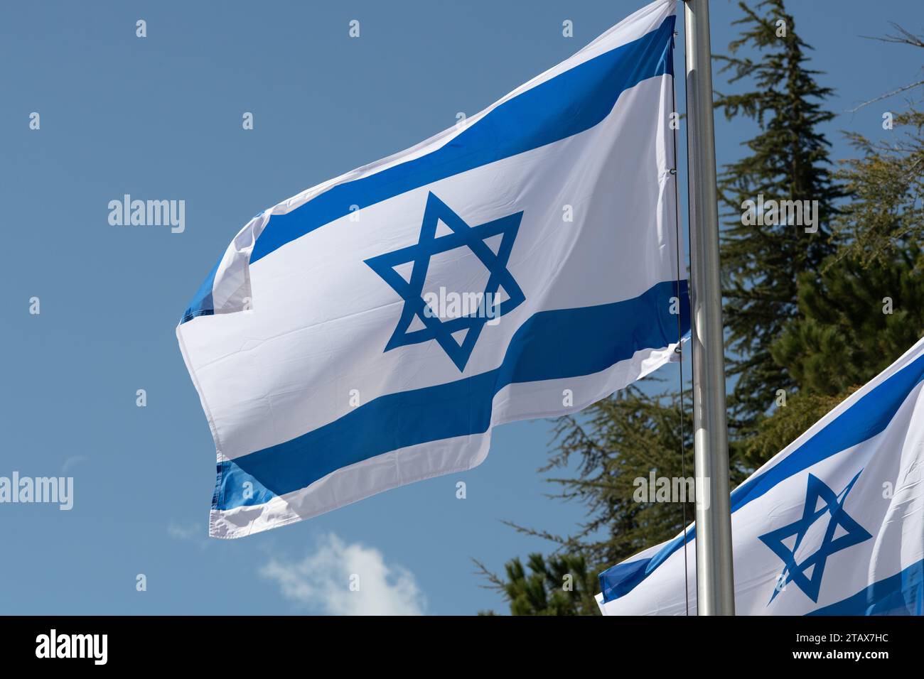 The Official Flag Of The State Of Israel With Blue And White Stripes