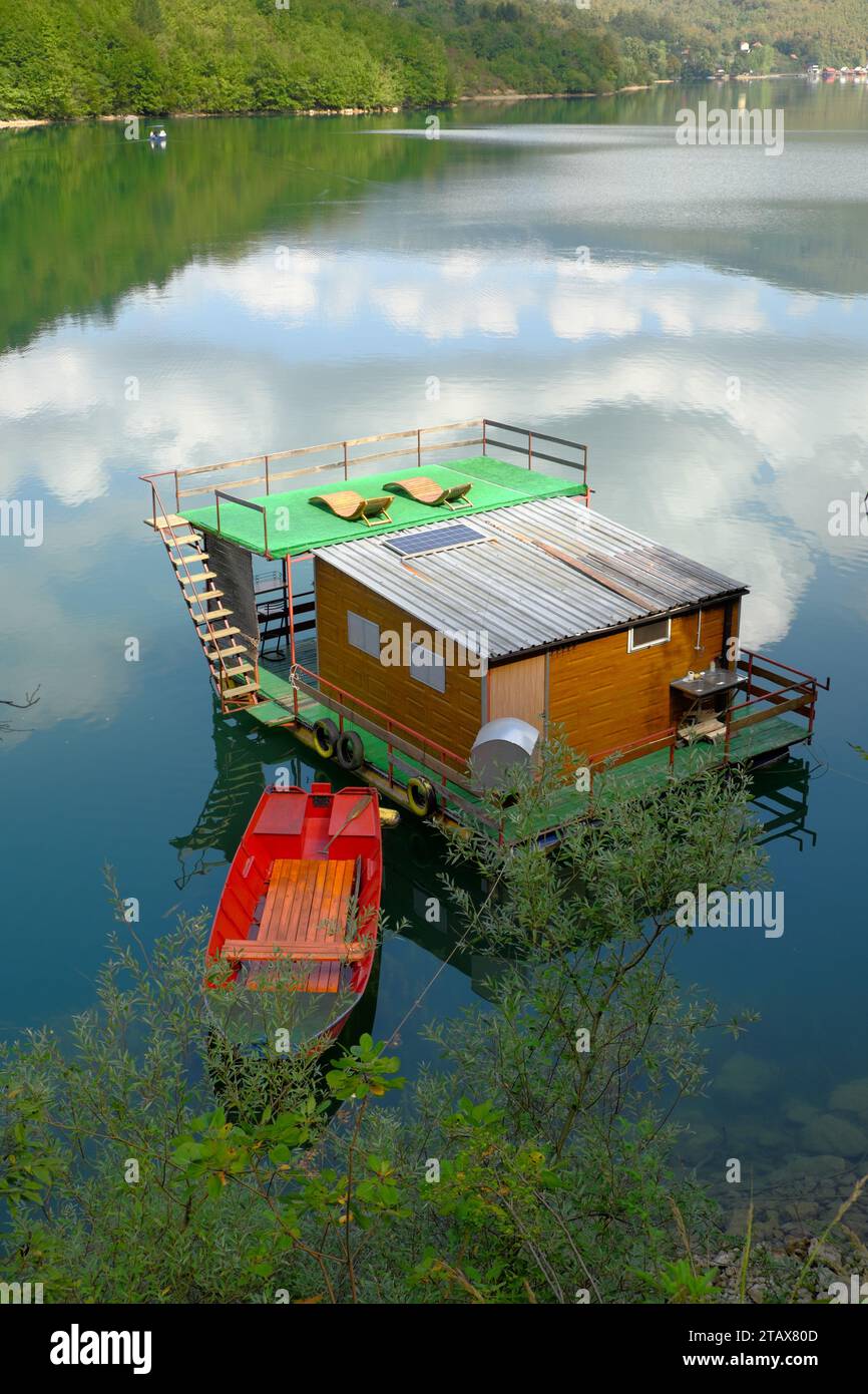 houseboat with row boat on Perucac Lake - Drina River, Bajina Basta ...
