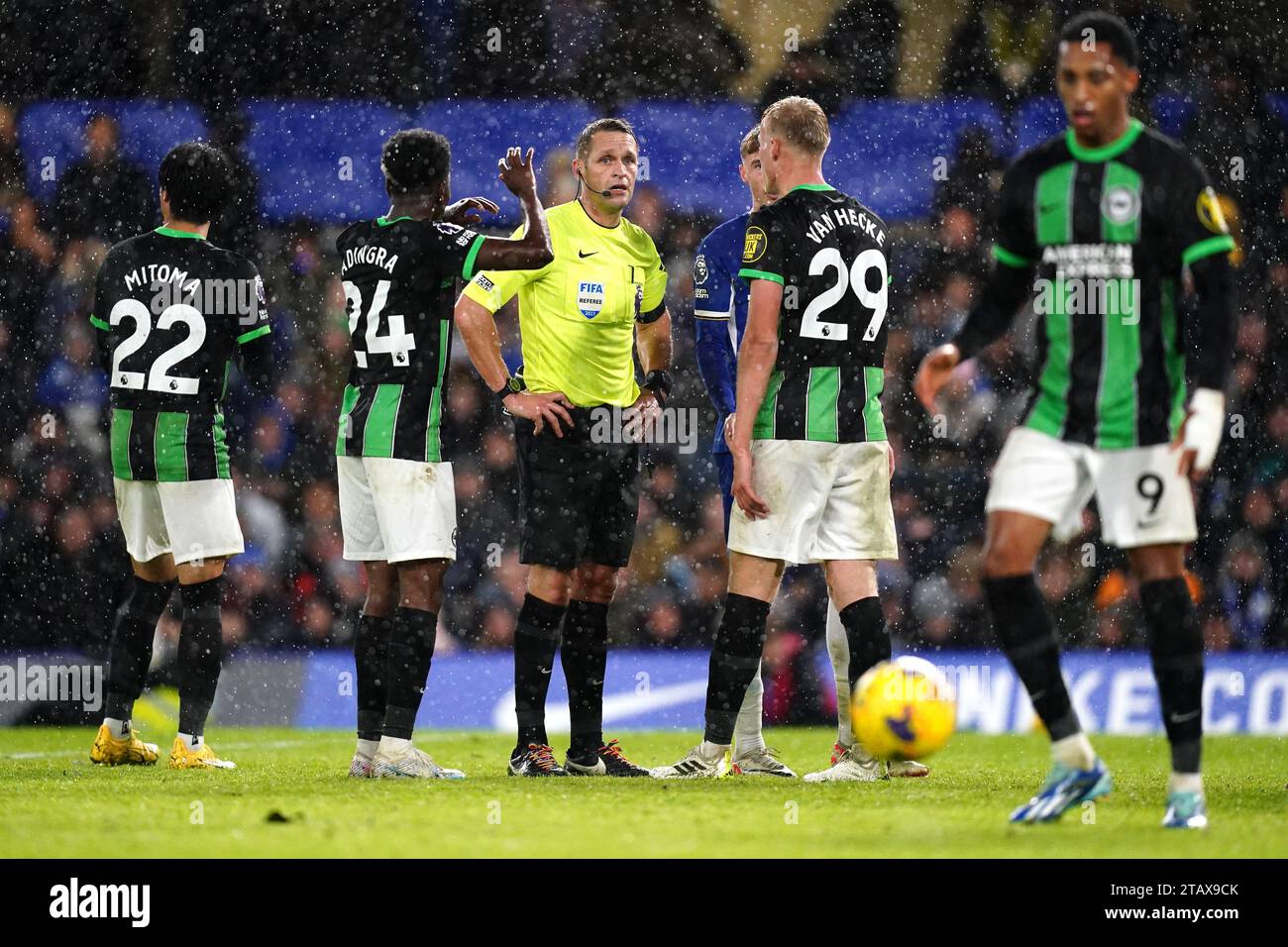 Brighton players appeal to referee Craig Pawson before a VAR check ...