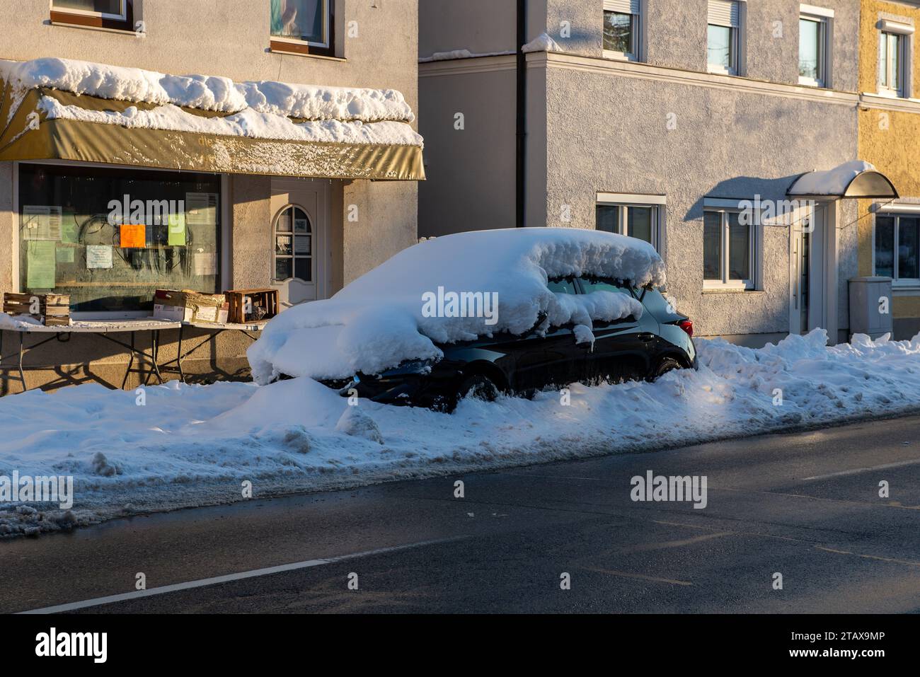Snowed in car by a street in Germany after heavy snowfall Stock Photo ...