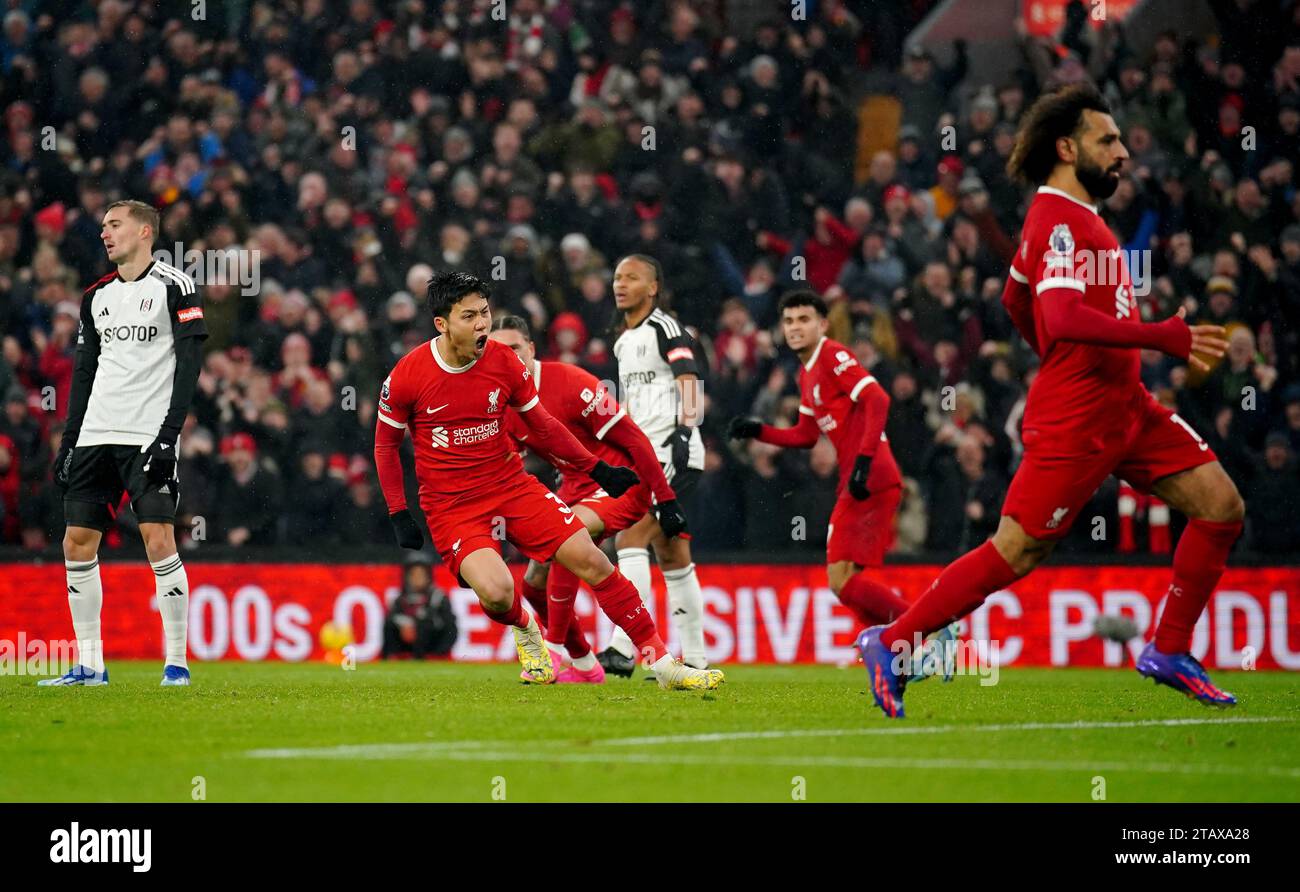 Liverpool's Wataru Endo (centre) celebrates scoring his sides third ...