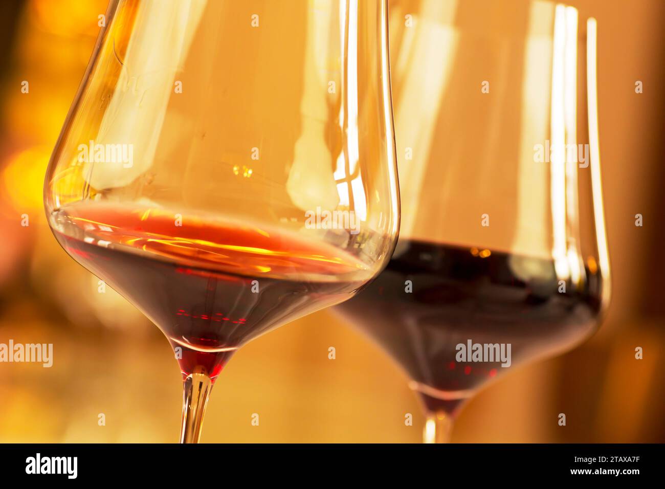 Glasses with red wine in a festive room for a celebration - selective ...