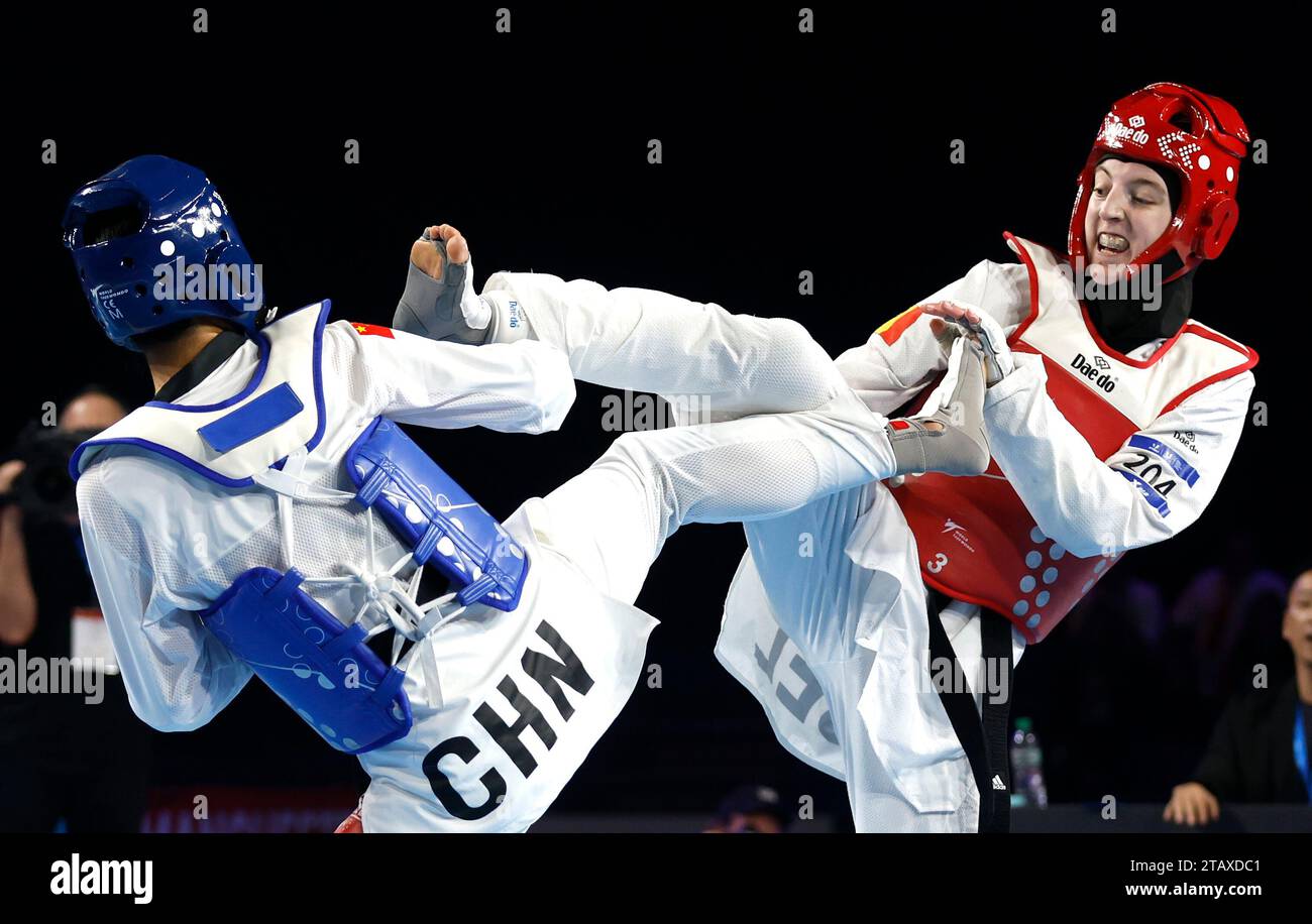 Belgium's Sarah Chaari (right) defeats China's Mengyu Zhang in the gold ...