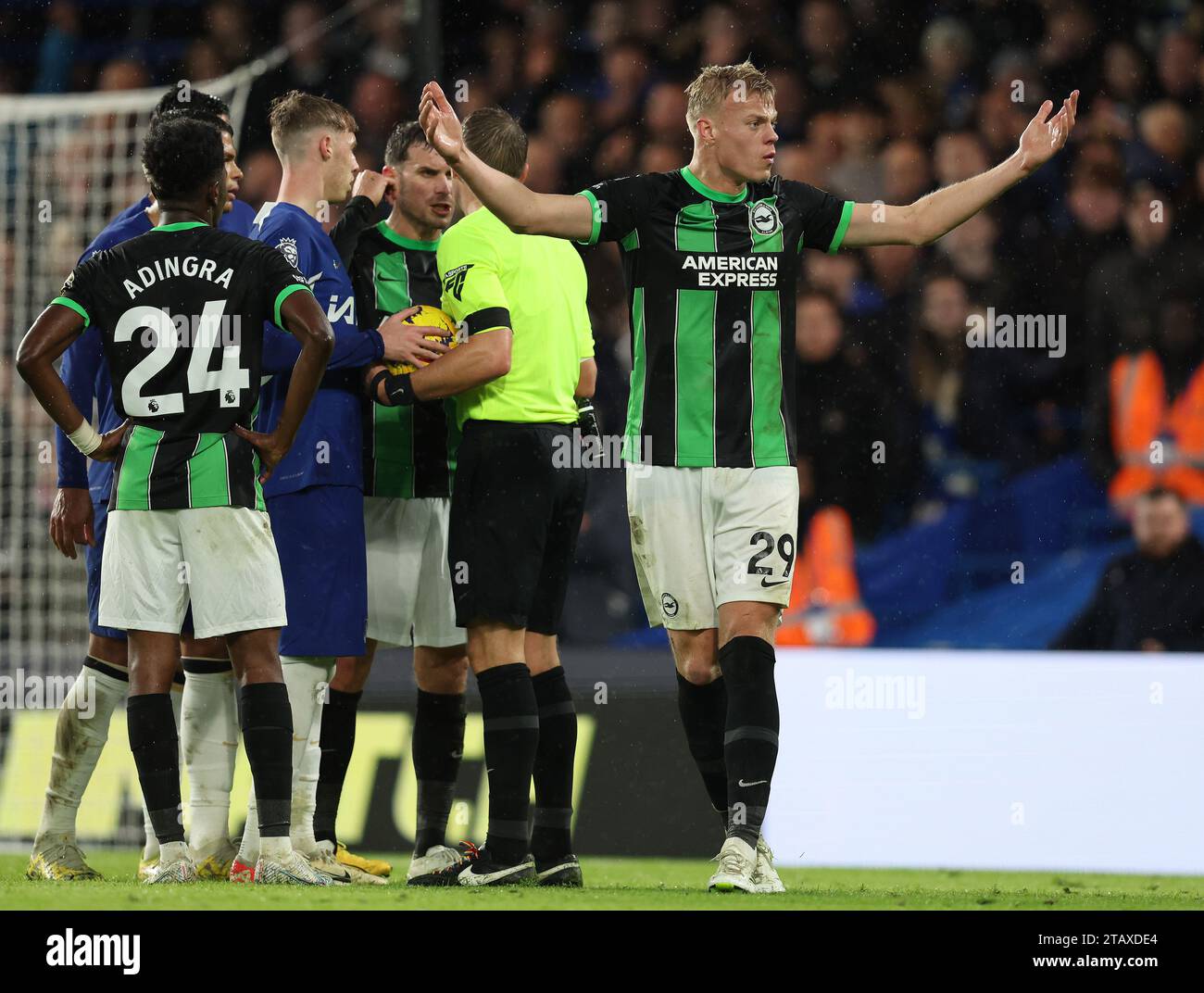 London, UK. 3rd Dec, 2023. Jan Paul van Hecke of Brighton and Hove Albion reacts after referee ...