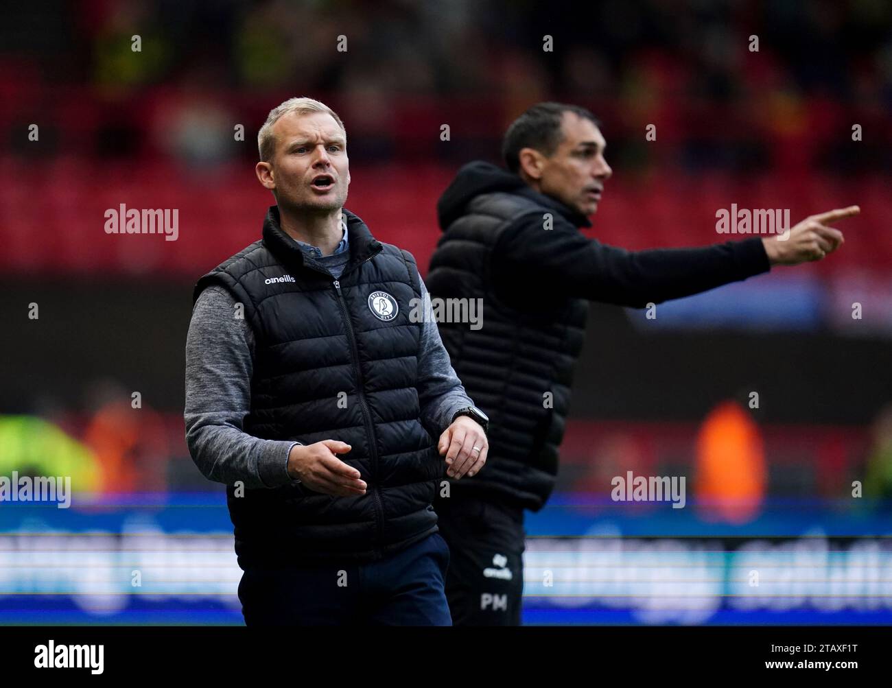 Bristol City manager Liam Manning (left) and goalkeeping coach Pat ...