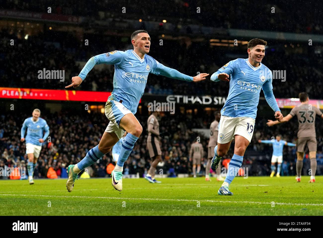 Manchester City's Phil Foden celebrates scoring their side's second ...