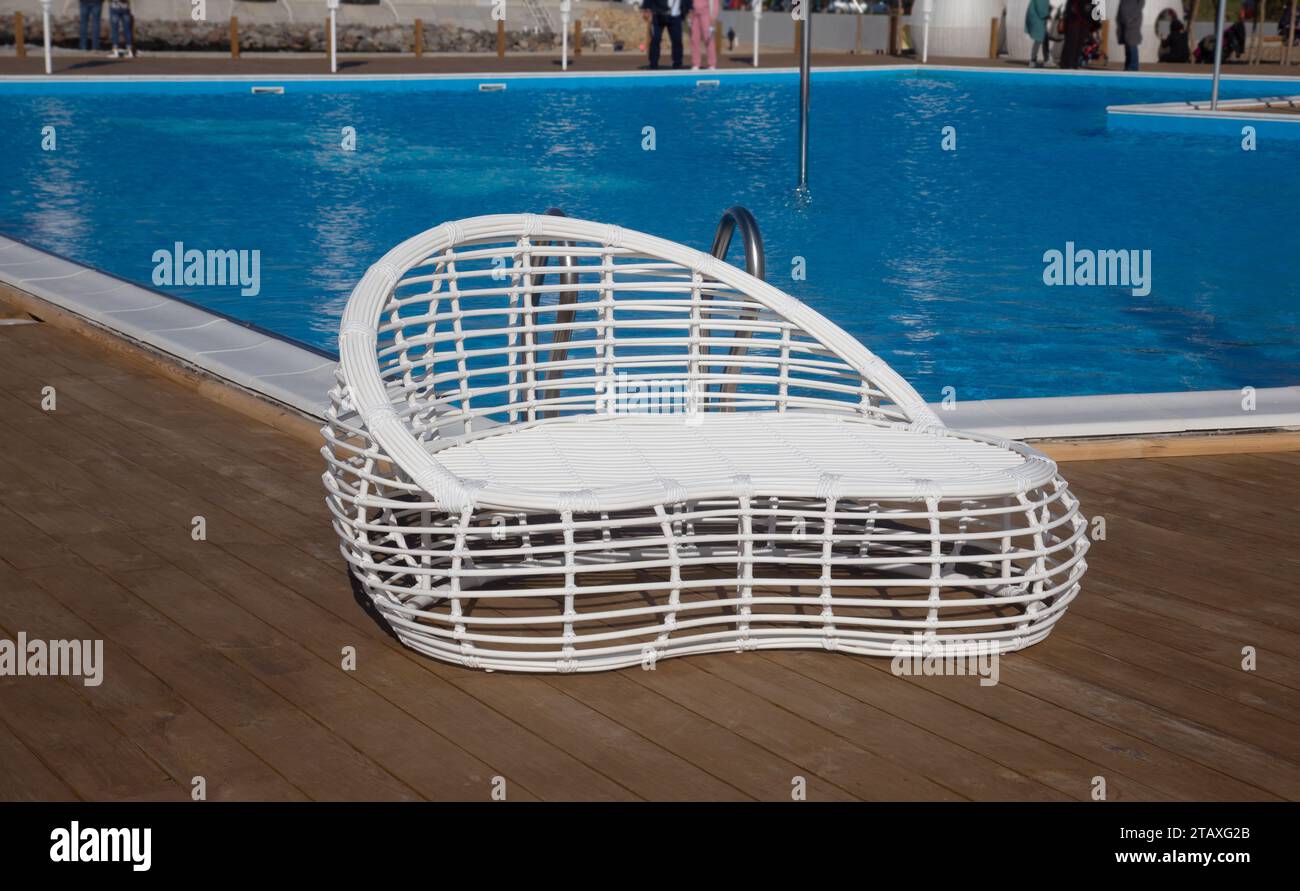 Modern white rattan furniture to create an outdoor pool in living room ...