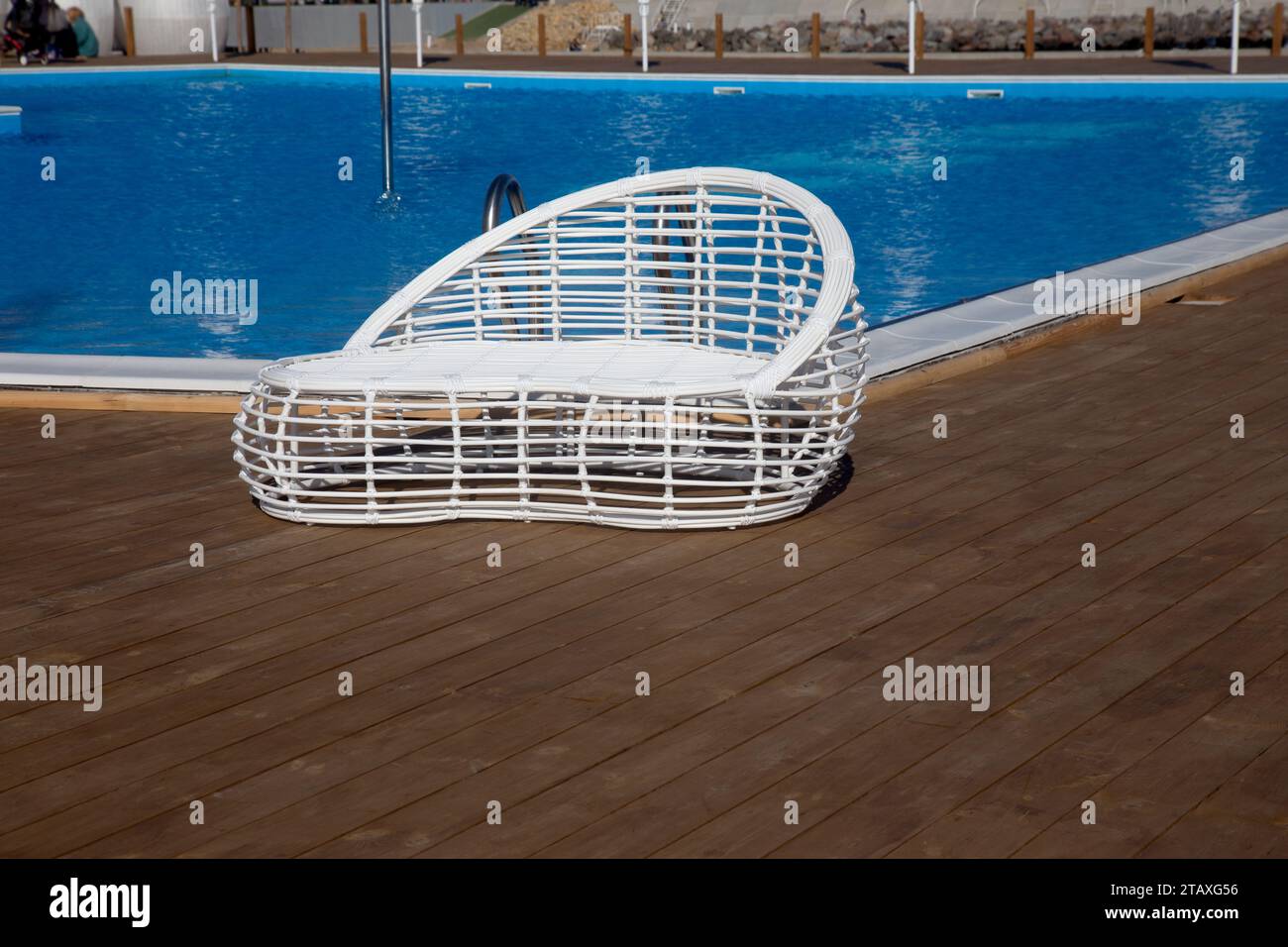 Modern white rattan furniture to create an outdoor pool in living room ...