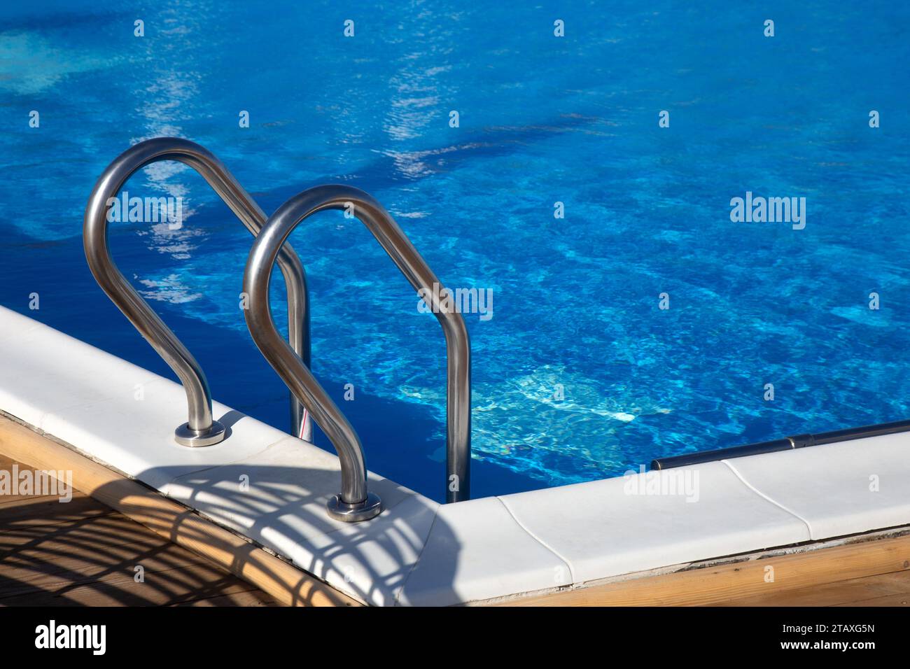 Modern white rattan furniture to create an outdoor pool in living room ...