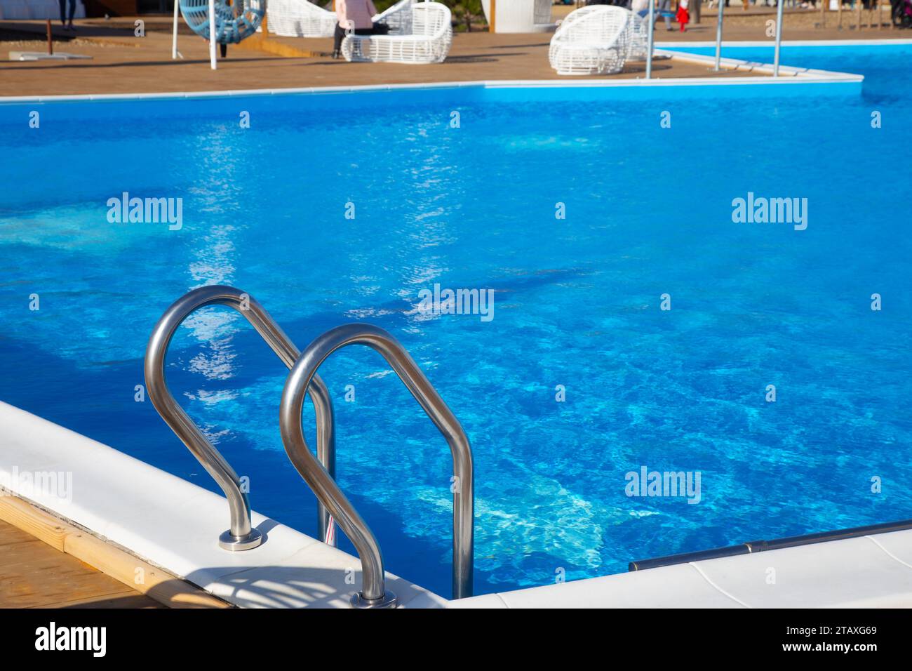 Modern white rattan furniture to create an outdoor pool in living room ...