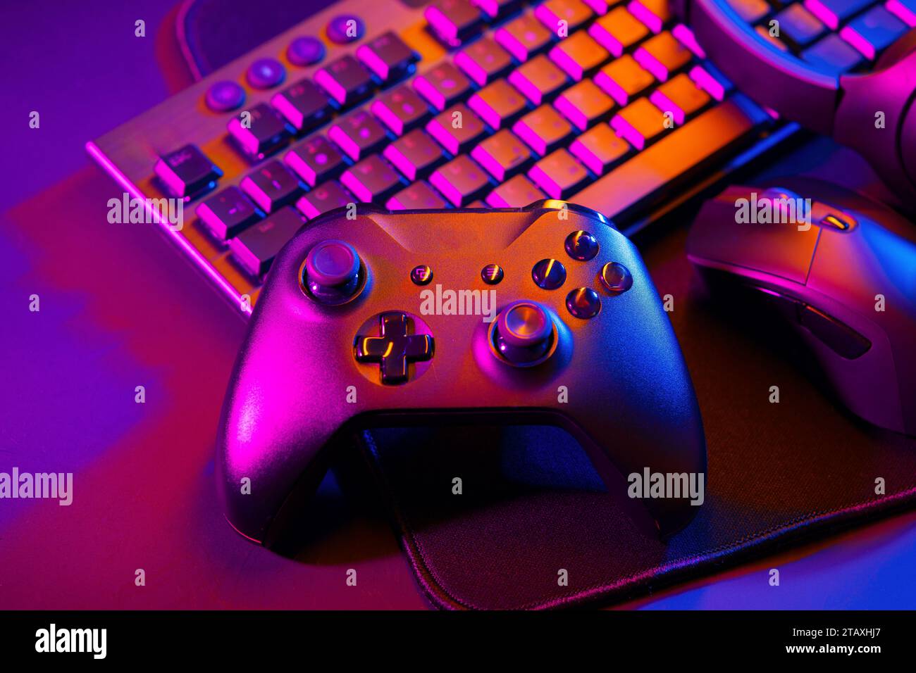 Computer keyboard, mouse and joystick on black background Stock Photo ...