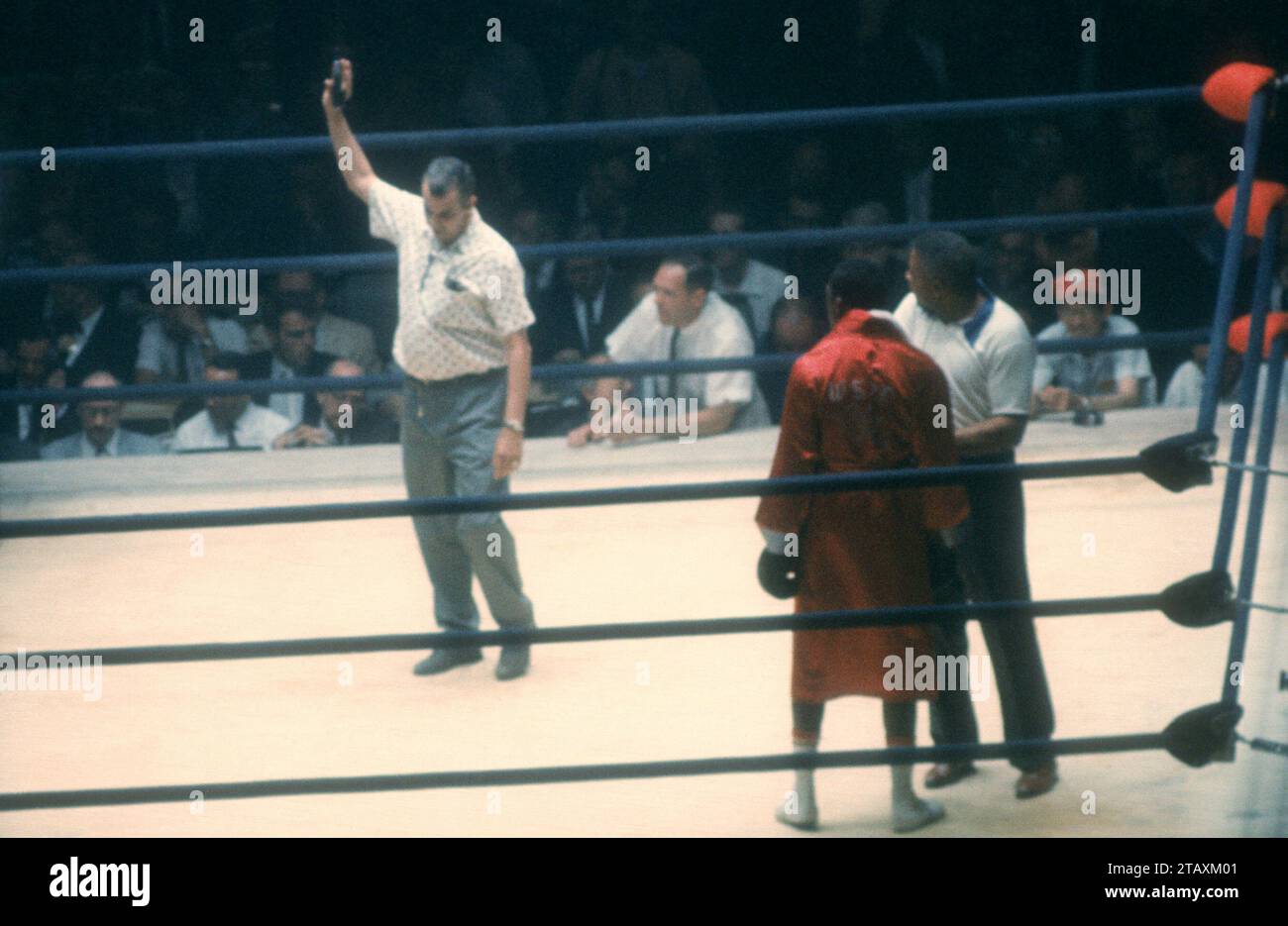 JULY, 1963: General view of an unidentified boxer being introduced to ...