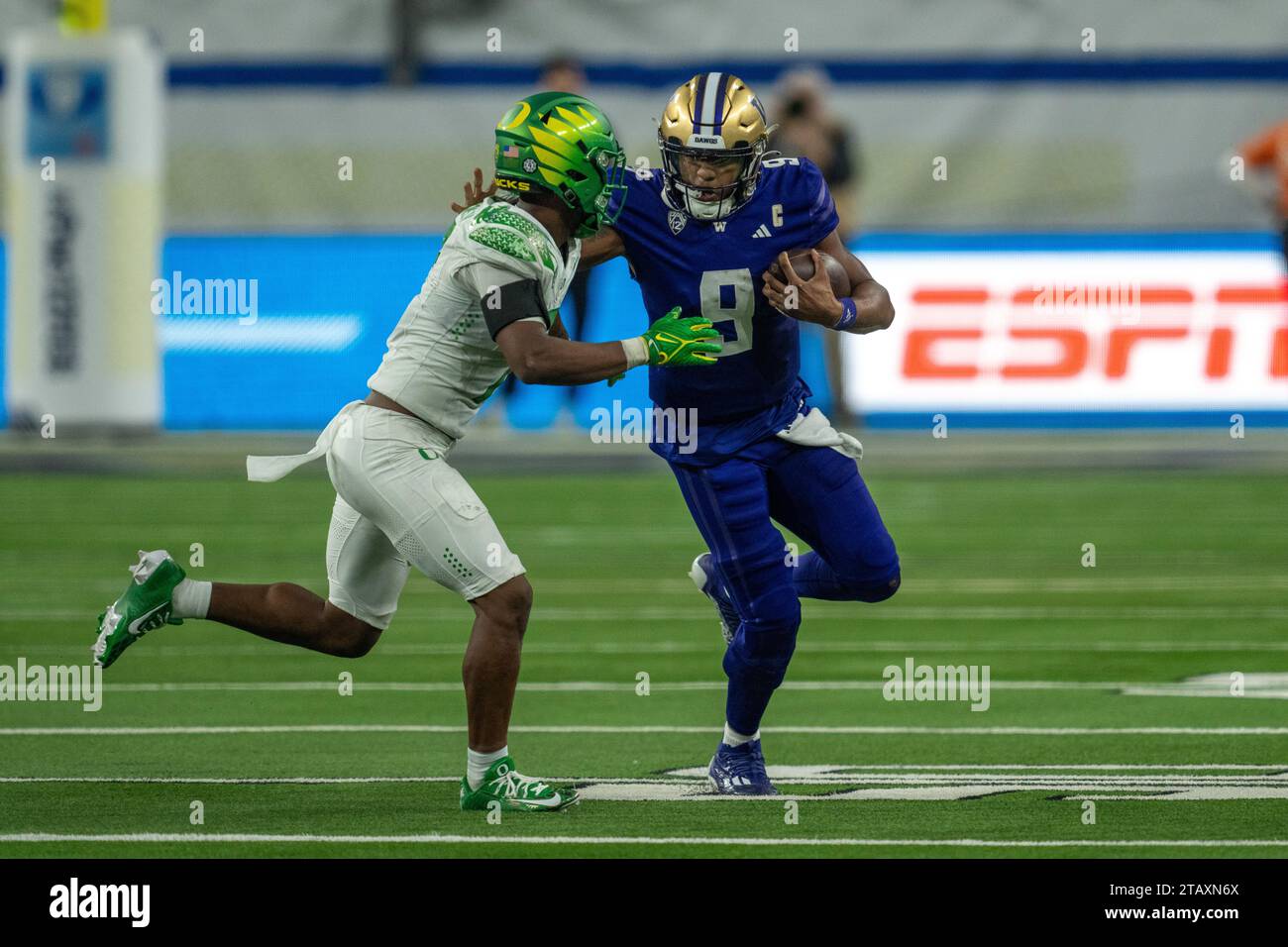 Washington Quarterback Michael Penix Jr. (9) runs with the football during the 2023 Pac-12 ...
