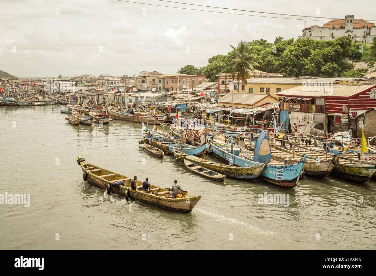 Colourful fishermen boats in port of Elmina, Ghana Stock Photo - Alamy