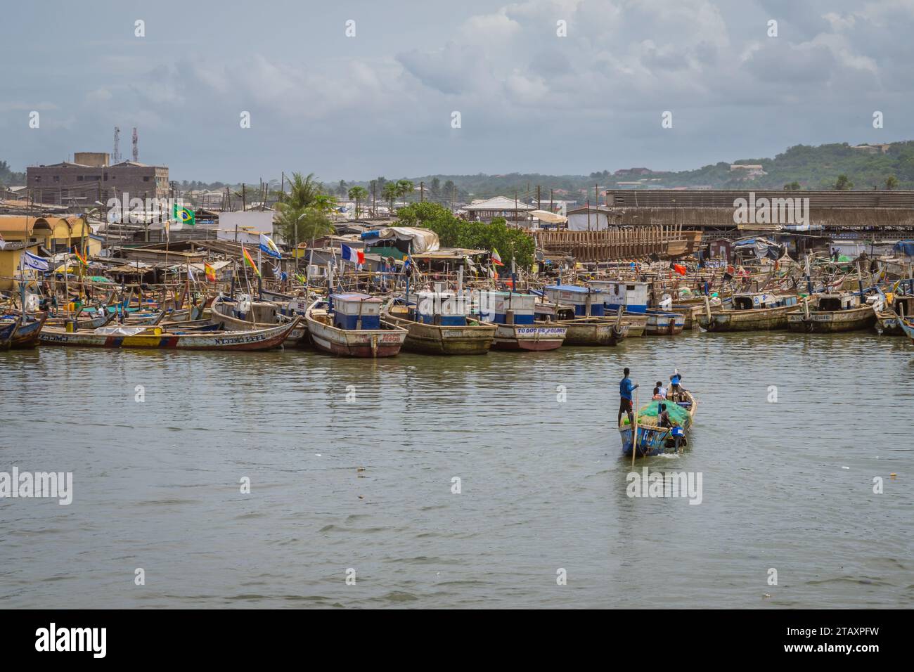 Colourful fishermen boats in port of Elmina, Ghana Stock Photo - Alamy